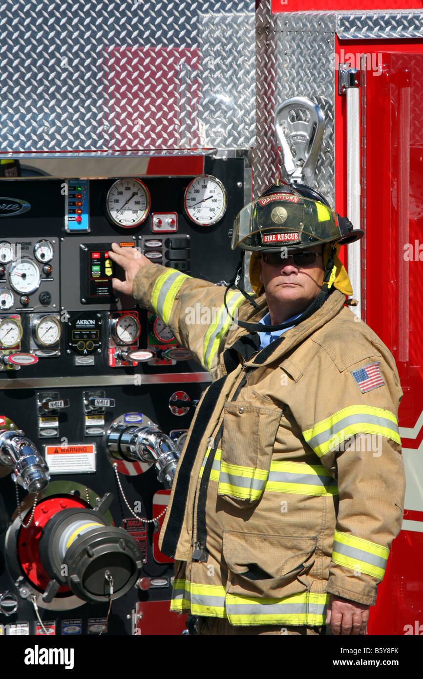 The MPO standing in front of the fire truck controls for water pumping ...