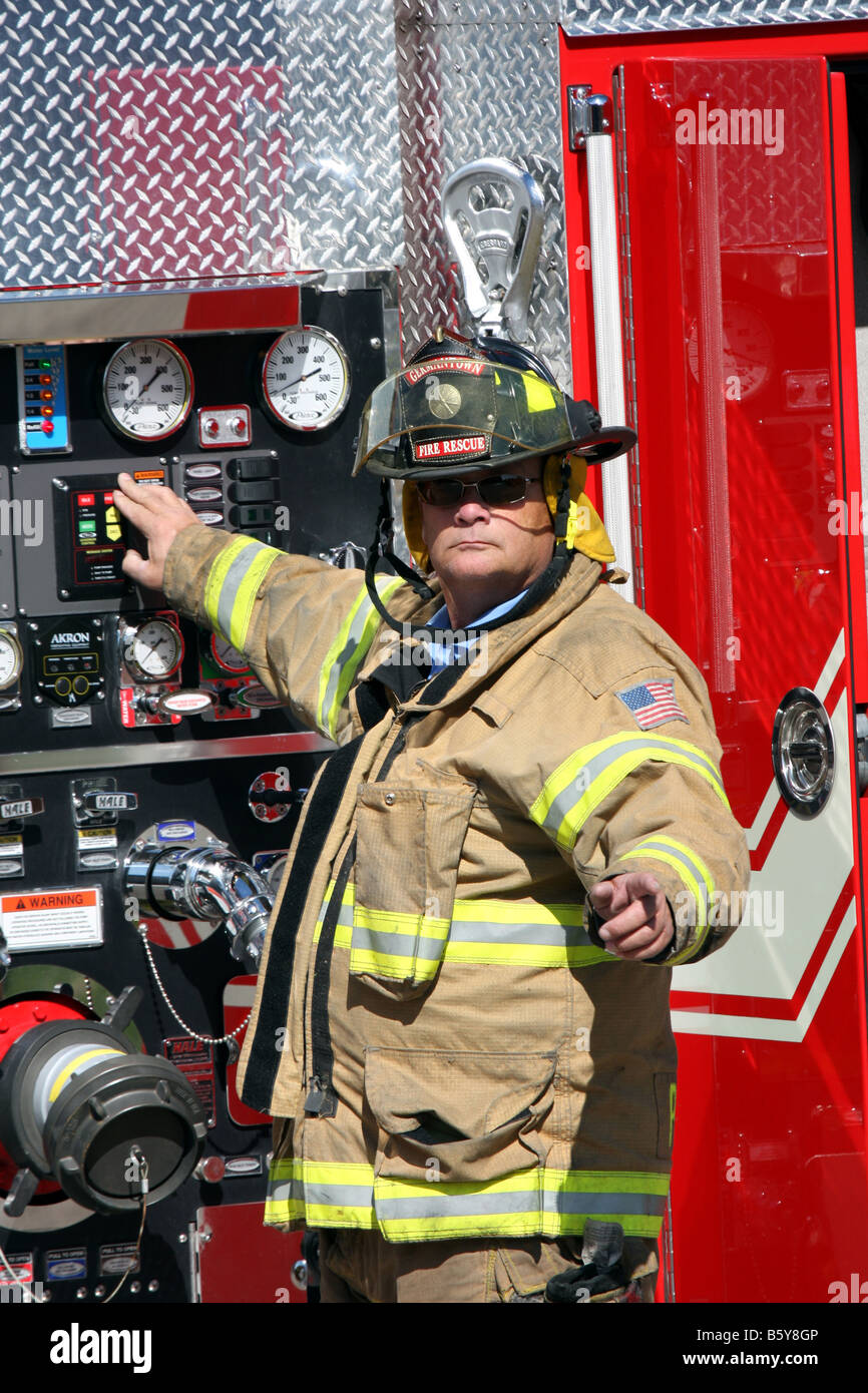 The MPO standing in front of the fire truck controls for water pumping ...