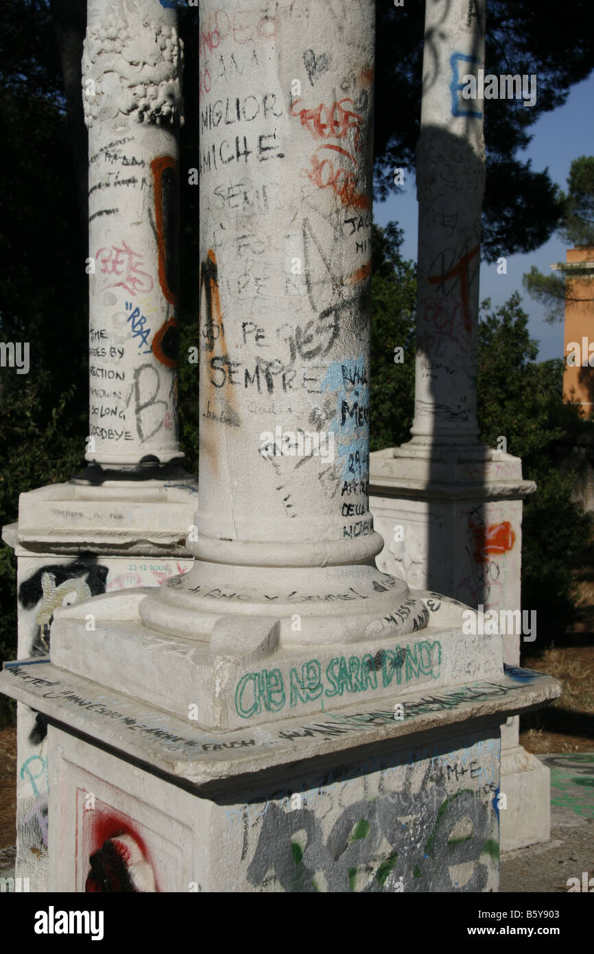 graffiti written on columns in park, rome Stock Photo - Alamy