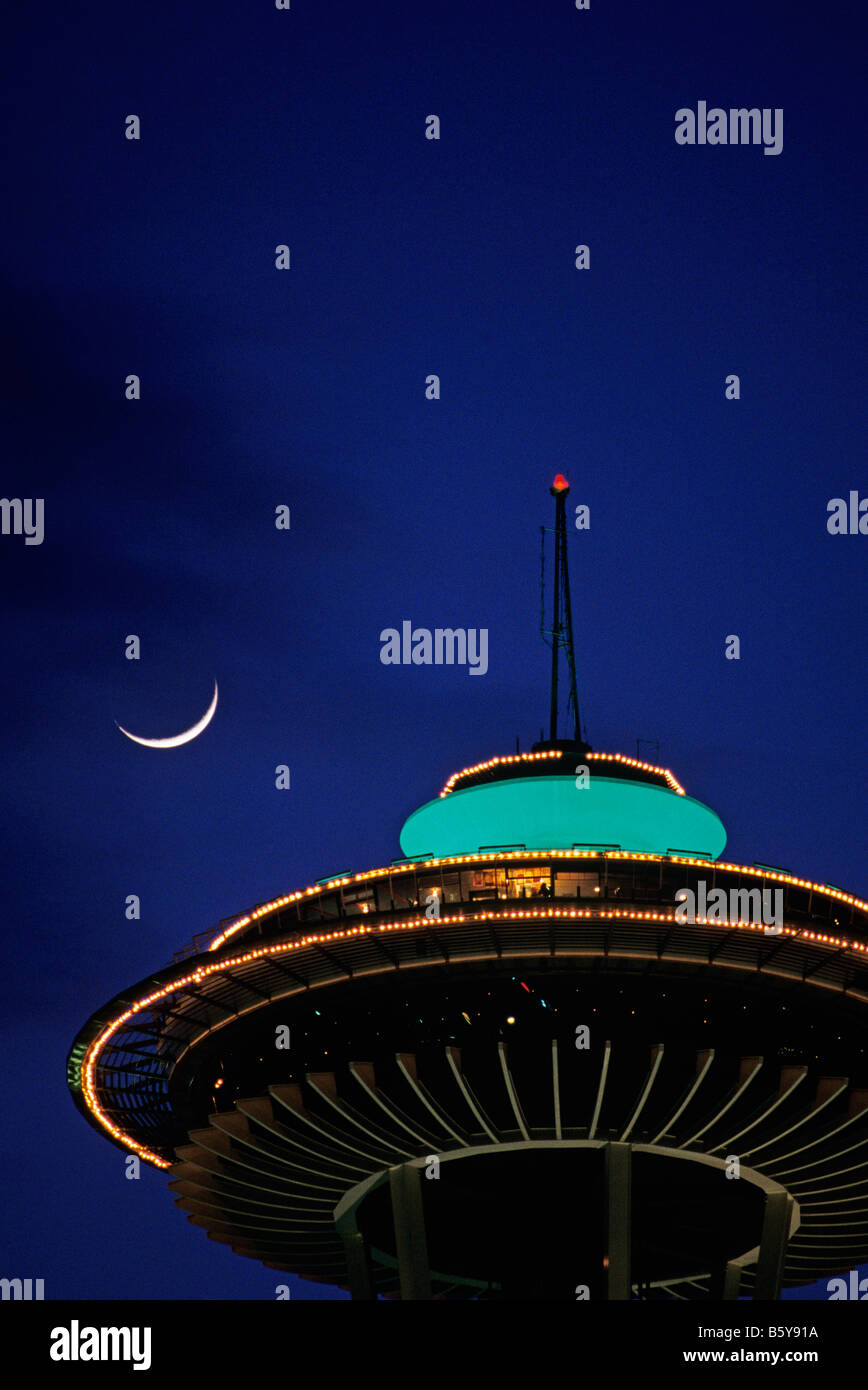 Evening light with Space Needle and crescent moon Stock Photo - Alamy