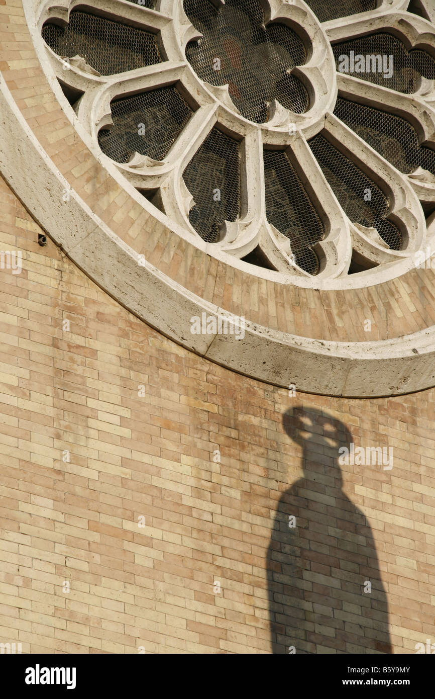 statue by church window in rome italy Stock Photo - Alamy
