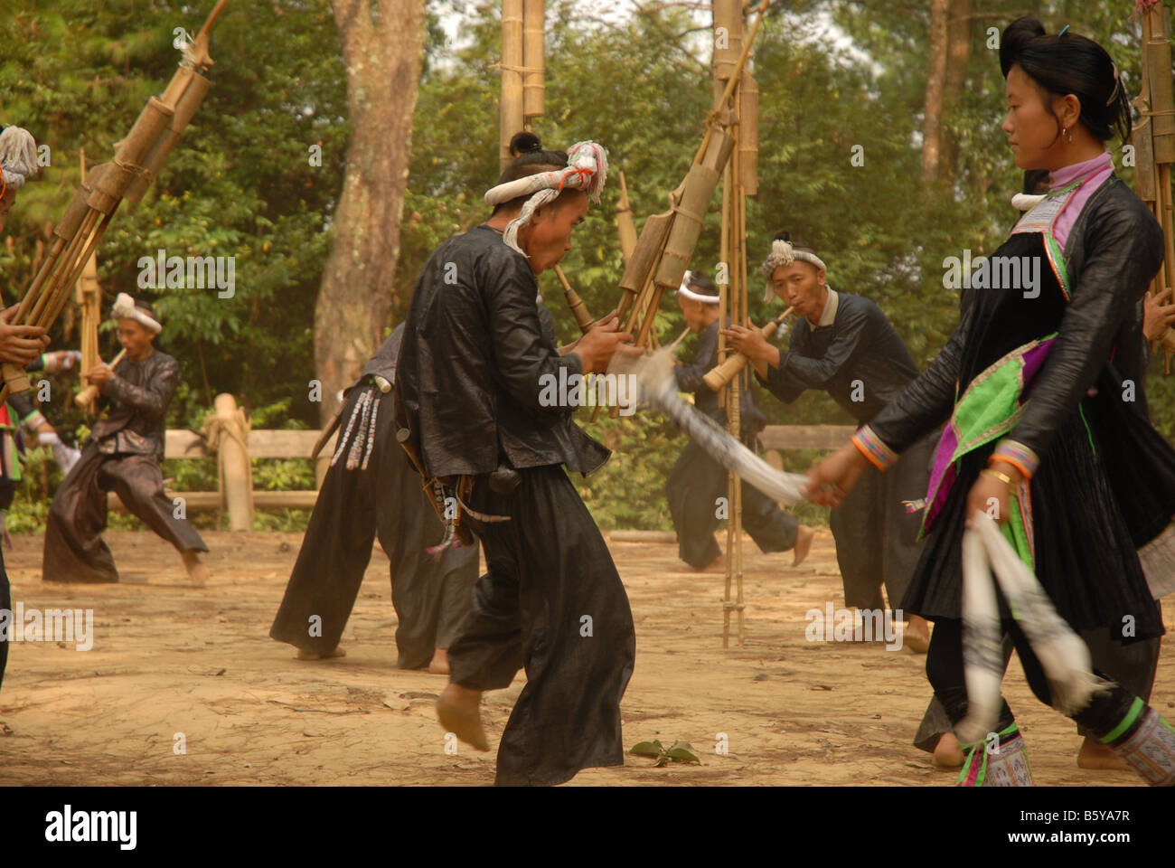 Miao (Hmong) tribal members perform a traditional dance in rural ...