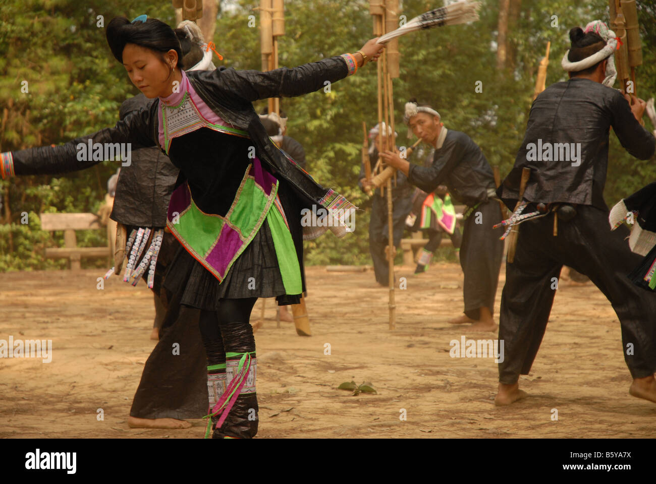 Miao (Hmong) tribal members perform a traditional dance in rural ...