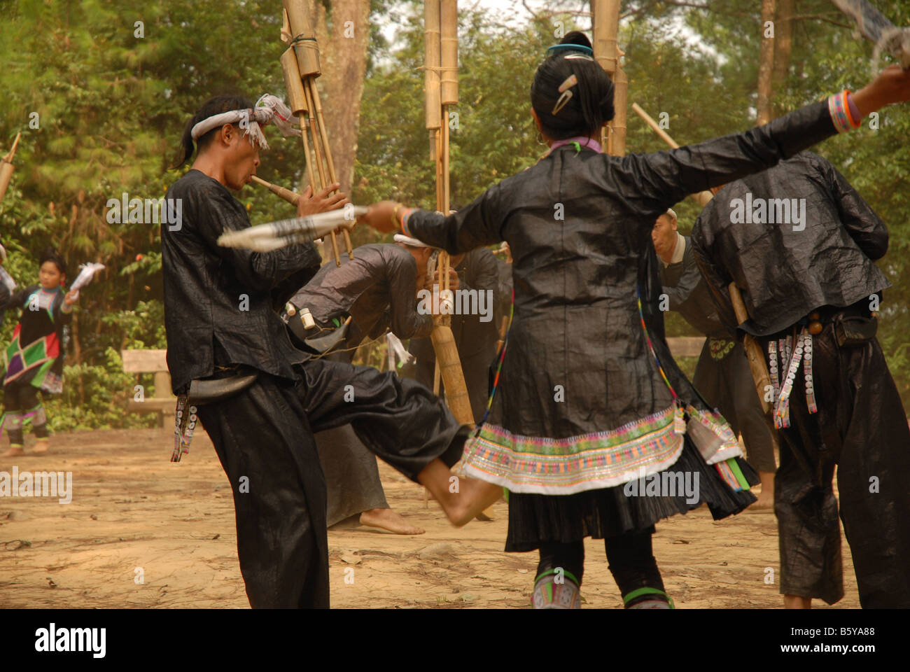 Miao (Hmong) tribal members perform a traditional dance in rural ...