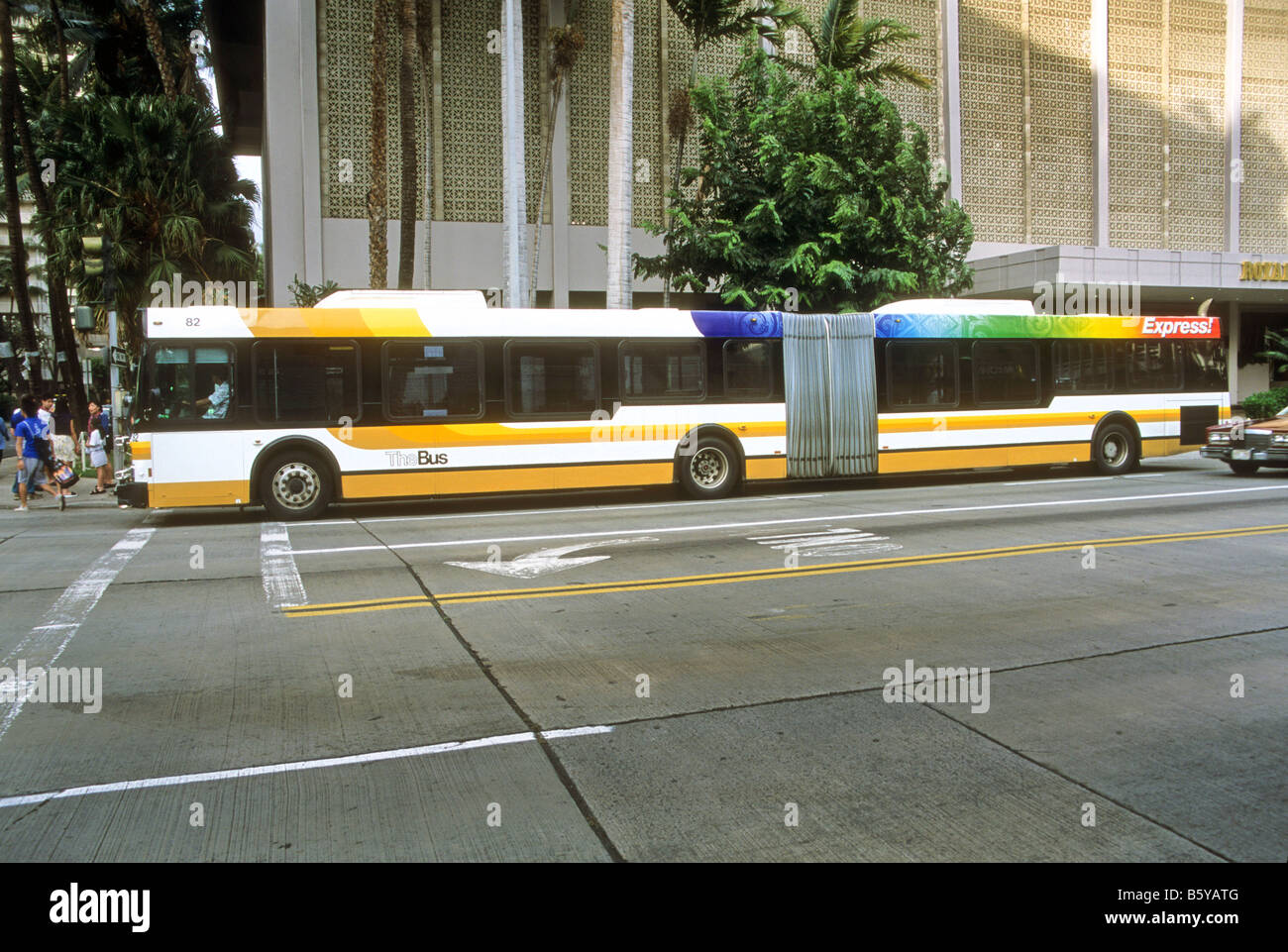 Two-section tandem city bus with flexible center to allow for turns ...