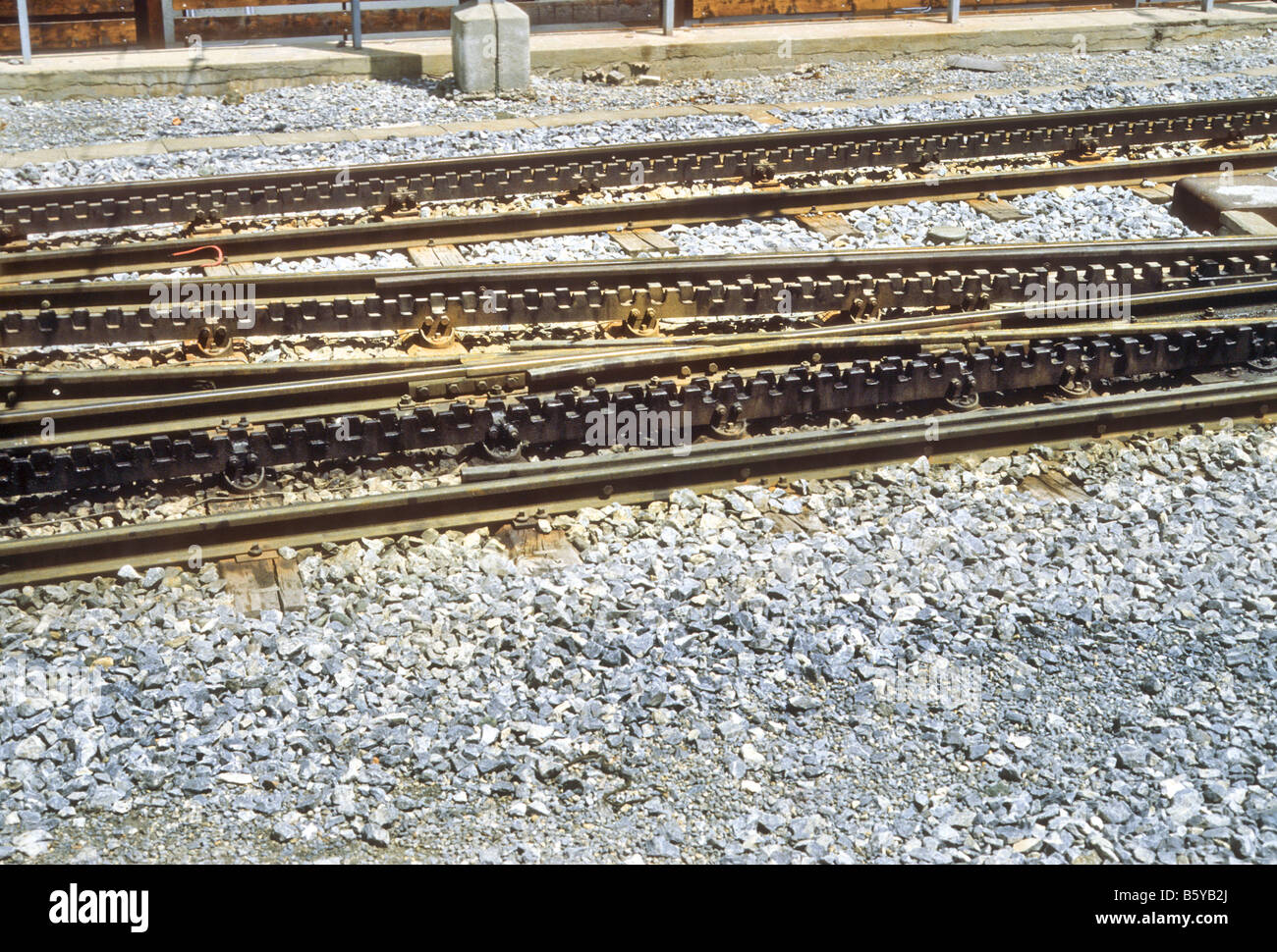 Cog tracks of Swiss train Stock Photo - Alamy