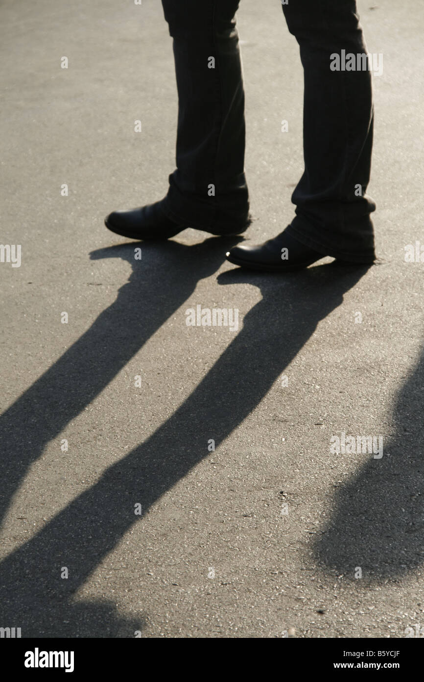 one person standing in street road Stock Photo - Alamy