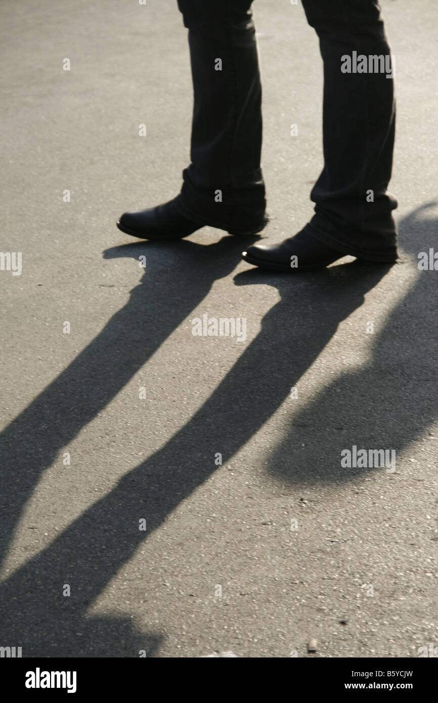 one person standing in street road Stock Photo - Alamy