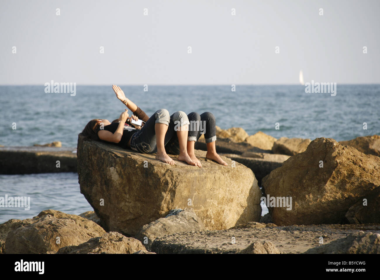 Silhouette Woman Lying Down In Stock Photos & Silhouette Woman Lying ...