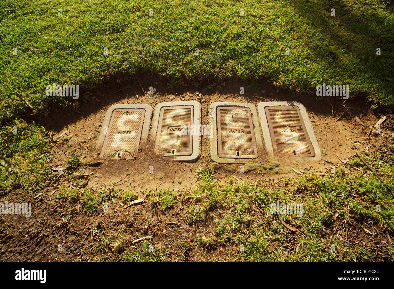 Water meters lawn irrigation Stock Photo - Alamy