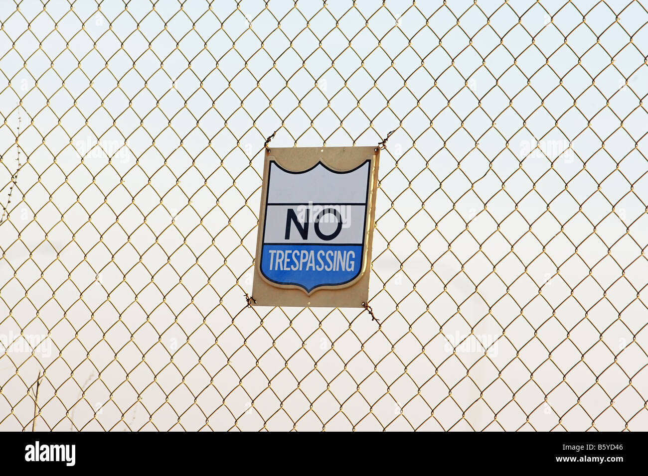 Government "No Trespassing" sign on chain link fence outside MCAS ...