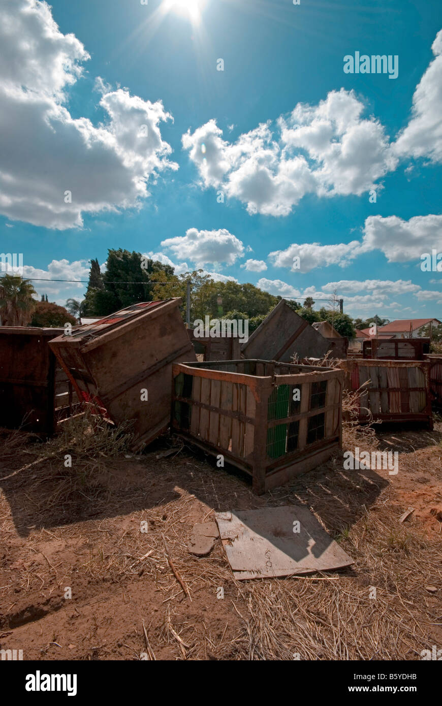 Discarded wooden crates in the landscape Stock Photo - Alamy