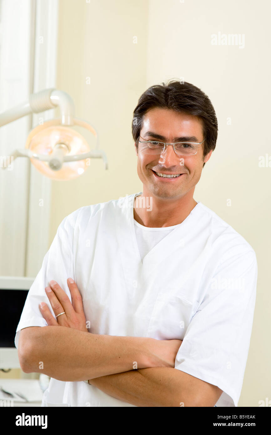 Dentist with arms crossed hi-res stock photography and images - Alamy