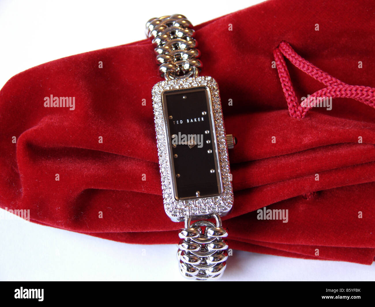 Watch displayed on a Red Velvet Pouch Stock Photo - Alamy