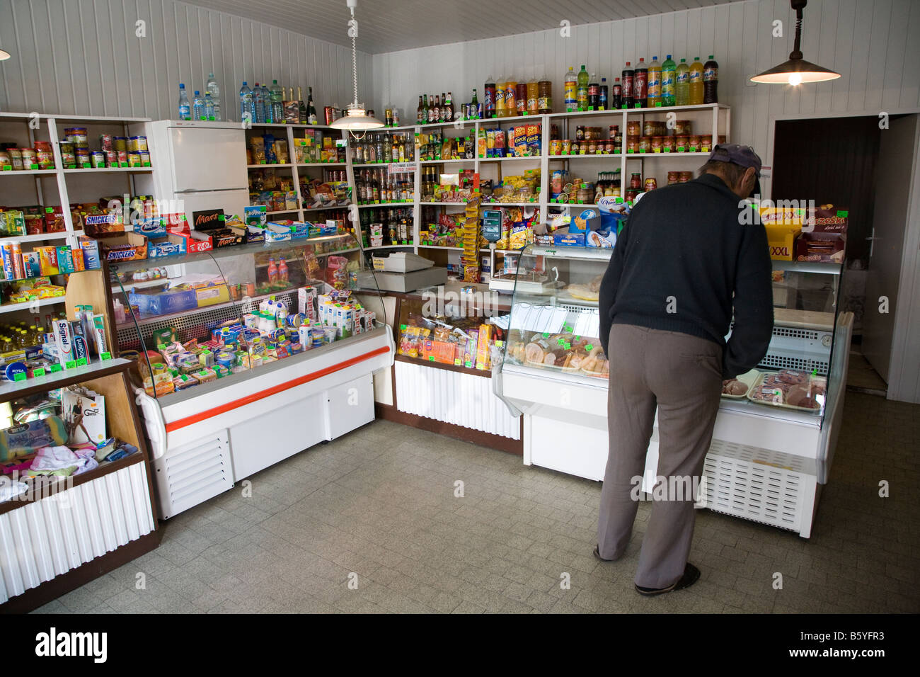 Man shopping in small village shop Poland Stock Photo - Alamy