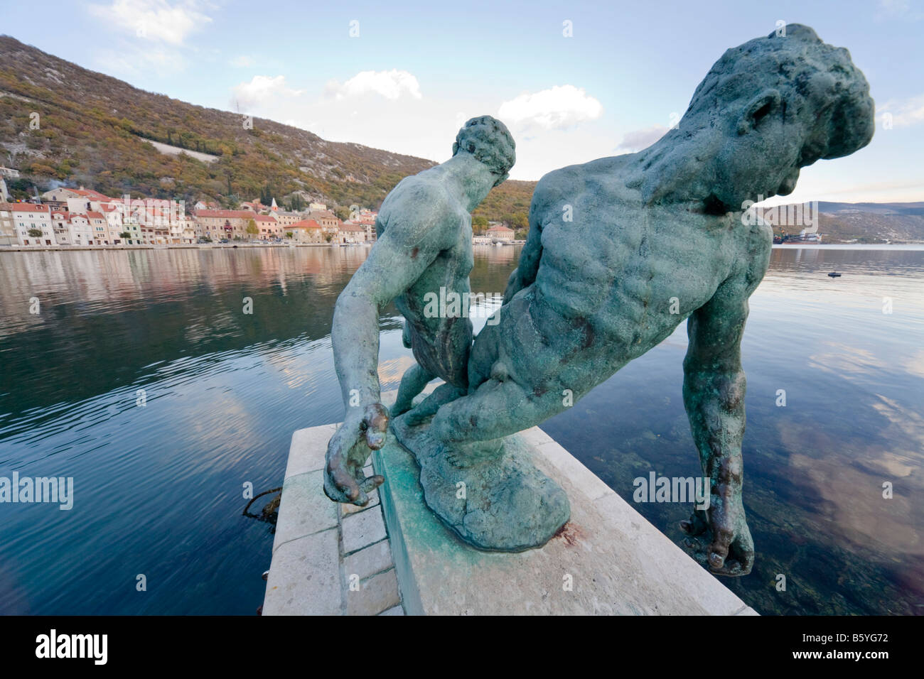 Bakar in Croatia, "Fishhermen are pulling net out of sea" statue by Frano Krsinic Stock Photo ...
