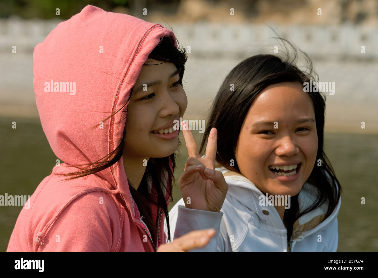 Vietnam outdoors outside people playful offspring female two Stock ...