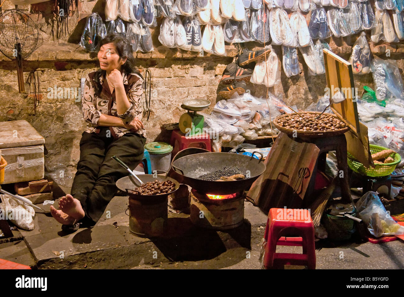 Vietnam shop shoe poor sell woman faint night stool arrangement wall ...