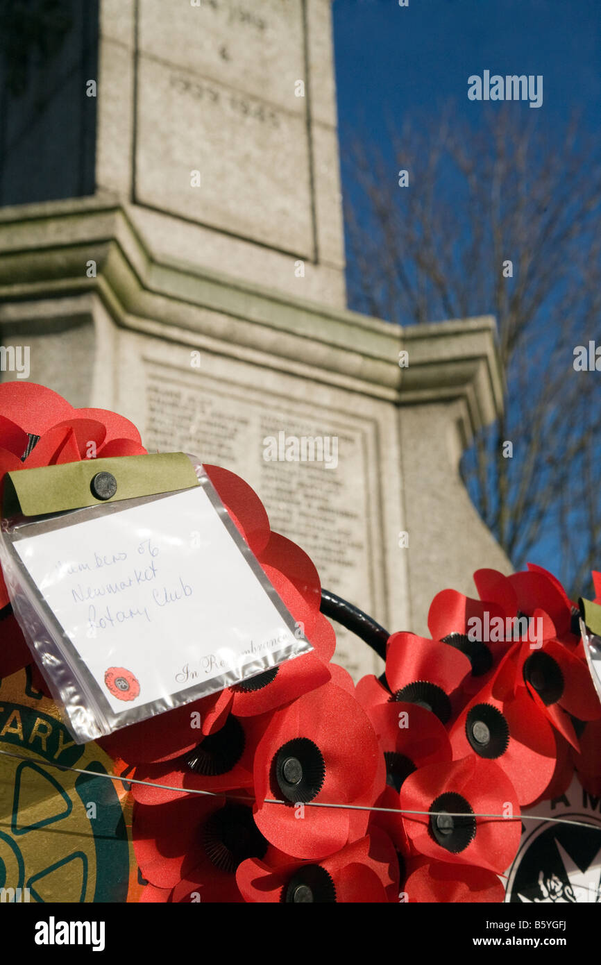Poppy wreaths at the base of the War memorial, Newmarket Suffolk, UK ...