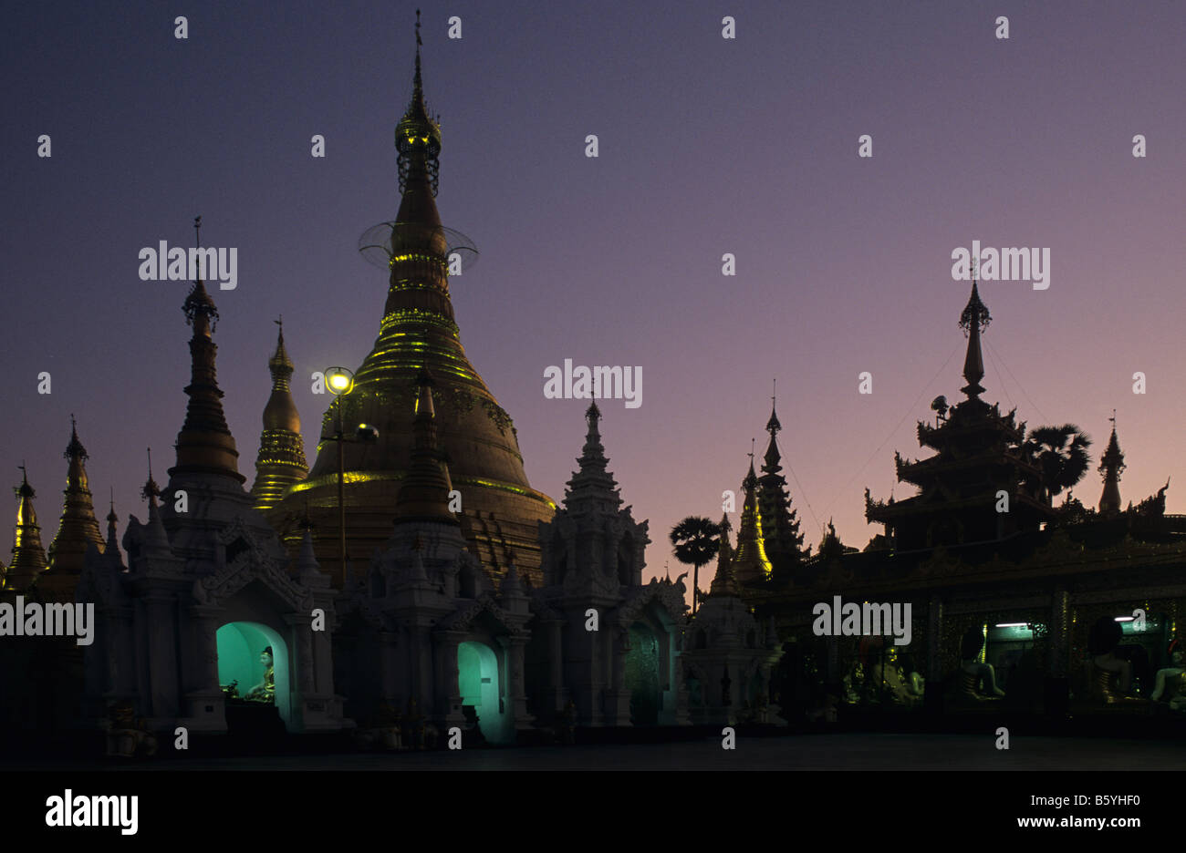 Shwedagon Paya, Burma's most sacred Buddhist site, at night, Rangoon or ...
