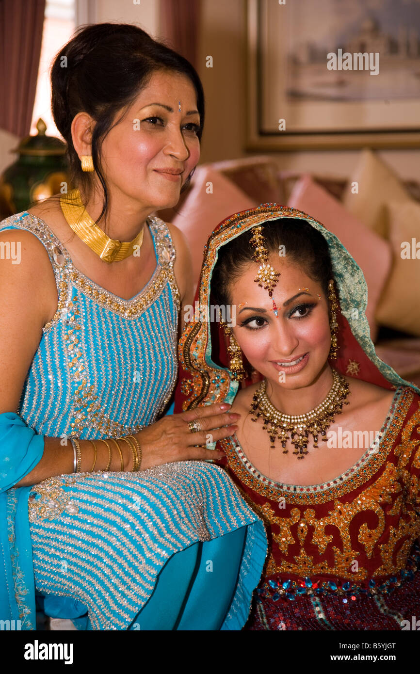 Sikh woman with mother getting ready for her marriage ceremony in ...