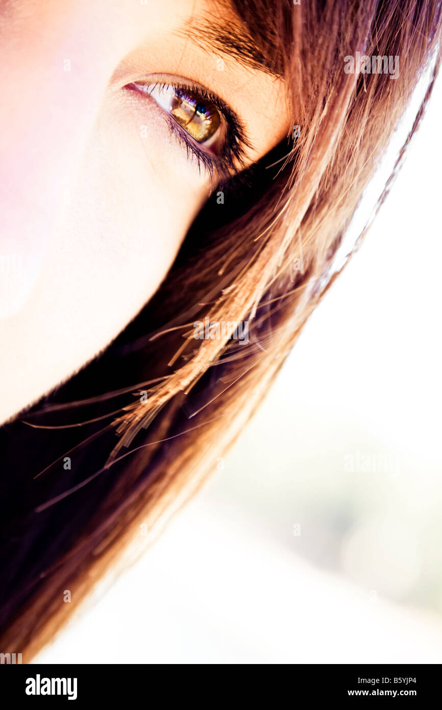 Young woman eye looking at something Stock Photo - Alamy