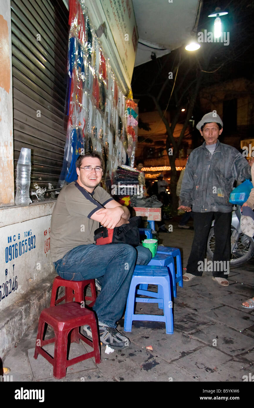 Vietnam street person light food stool shop shine style floor night ...