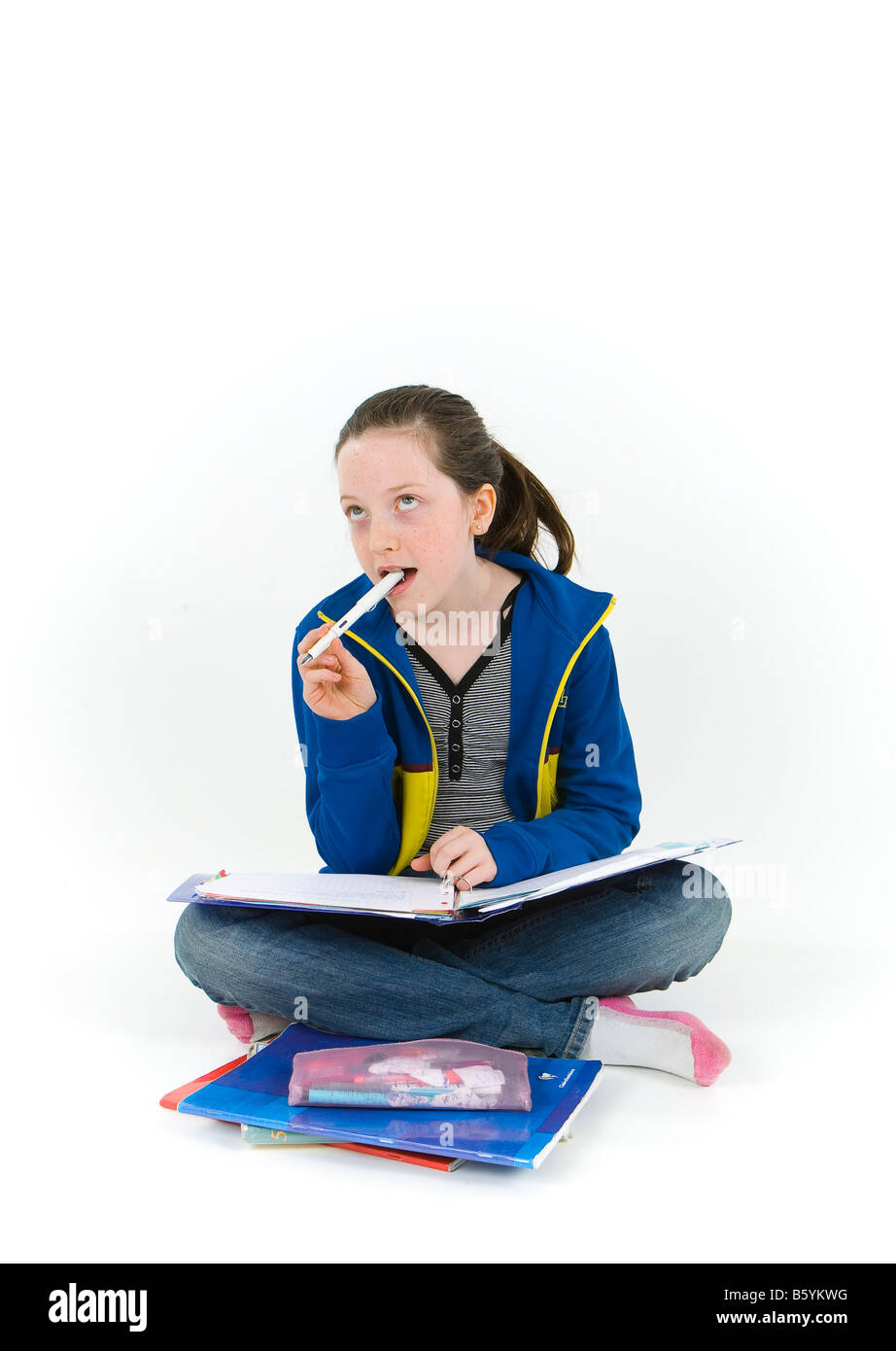 Young girl doing homework Stock Photo - Alamy