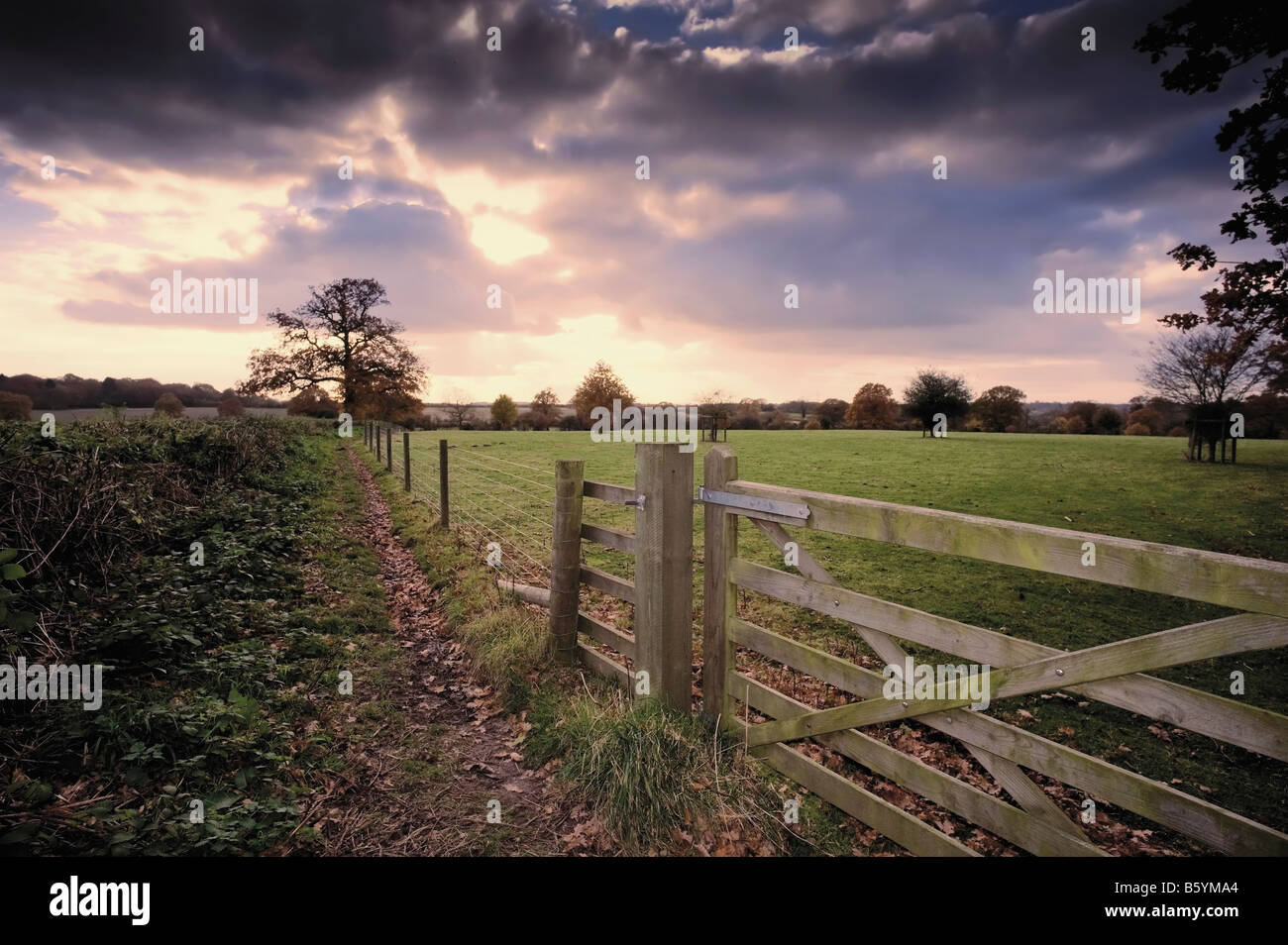 A winter sunset in the countryside Stock Photo - Alamy