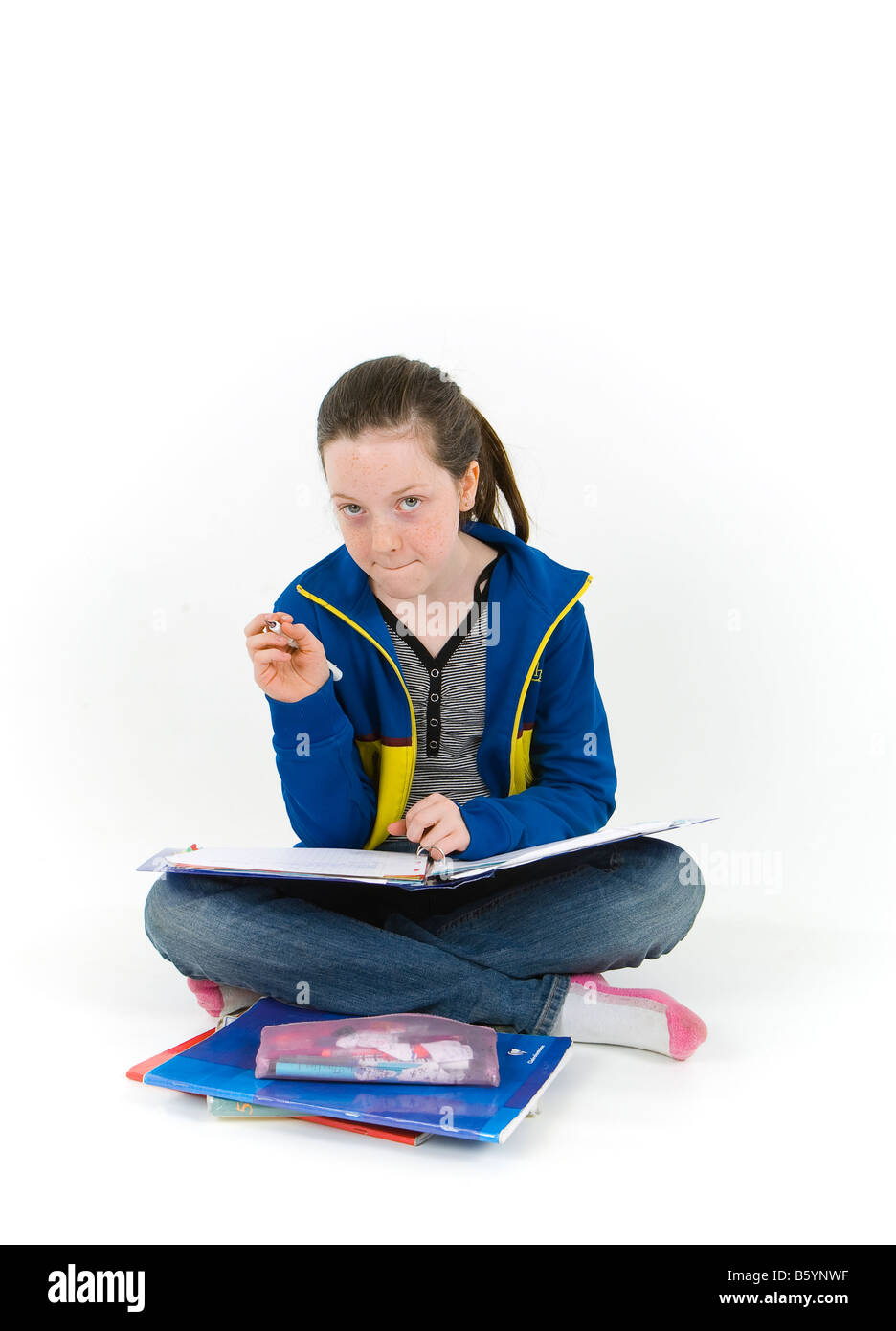 Young girl doing homework Stock Photo - Alamy