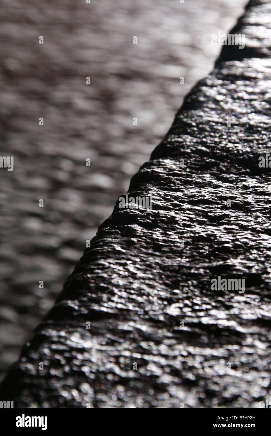 detail of dark damp wet stone wall in alley way at night Stock Photo ...