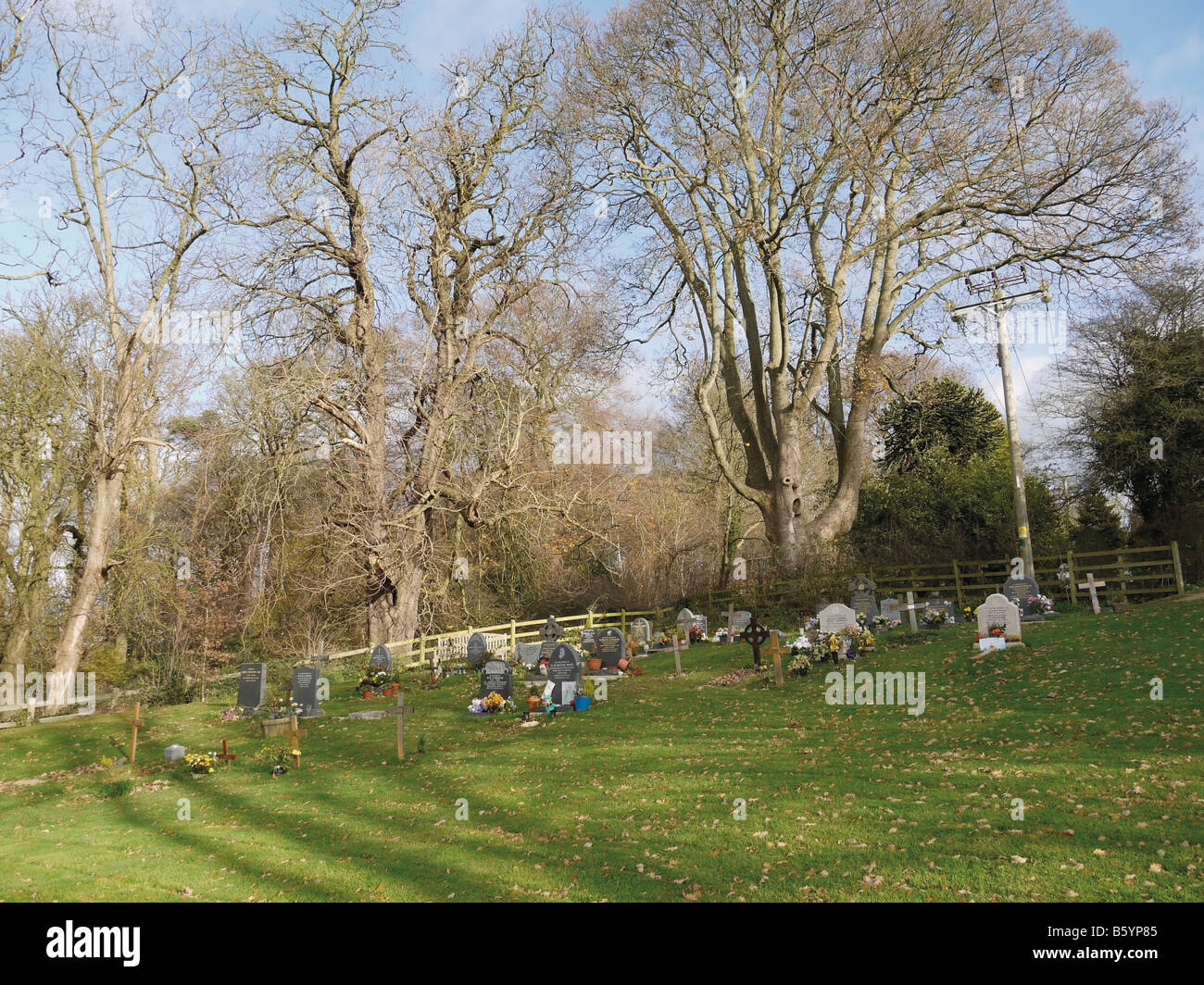 a cemetery in a church graveyard Stock Photo - Alamy