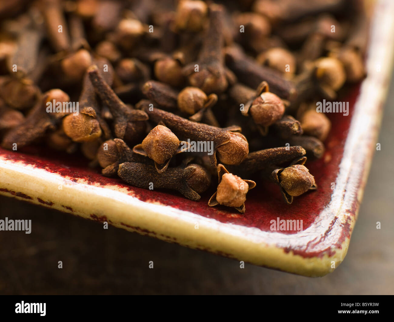 Plate of Whole Cloves Stock Photo - Alamy