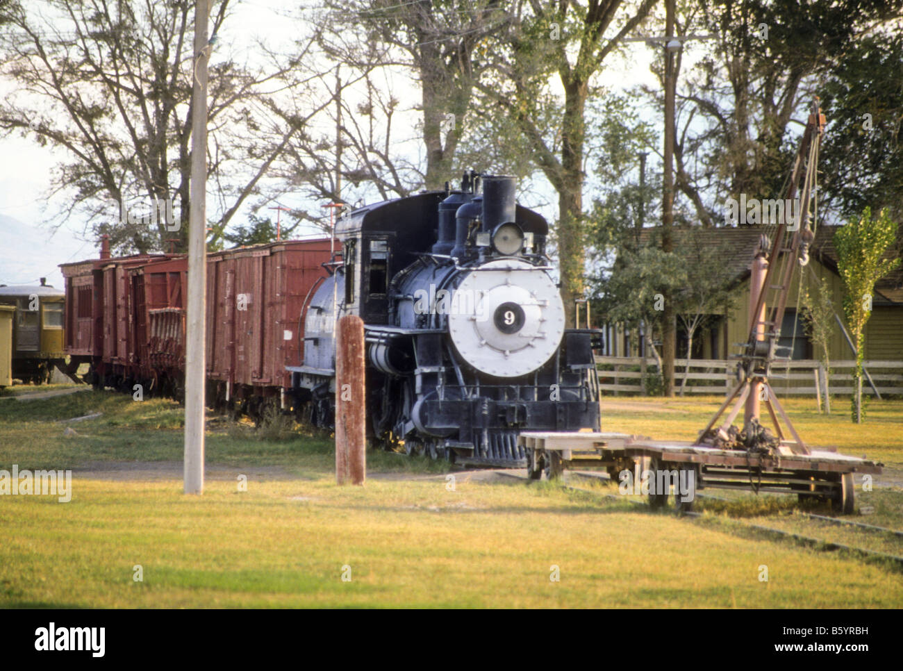 Classic steam engine with old freight box cars at train museum, Law ...