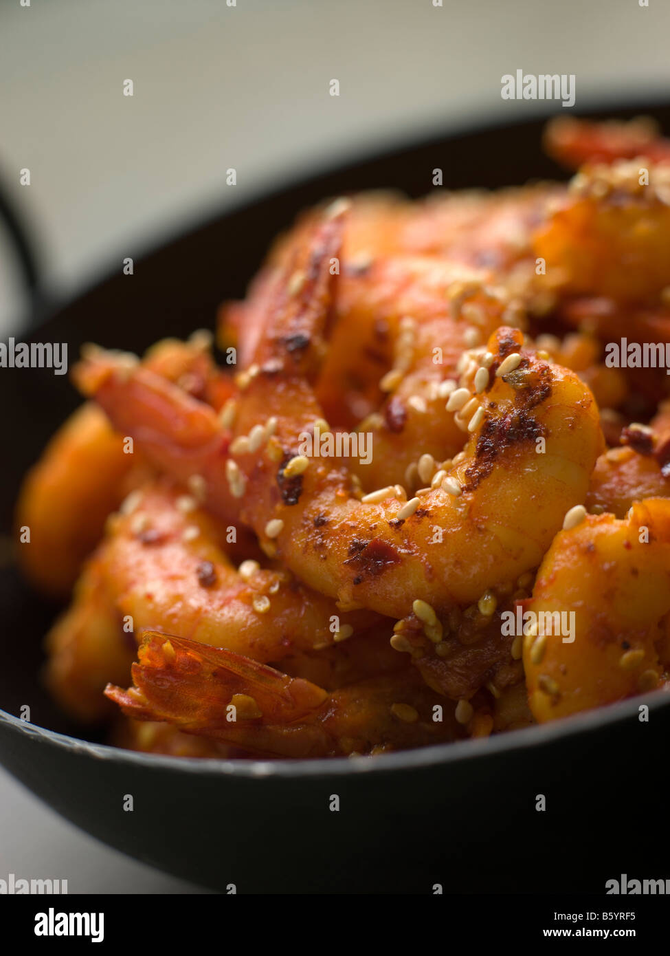 Chili and Sesame fried King Prawns Stock Photo - Alamy