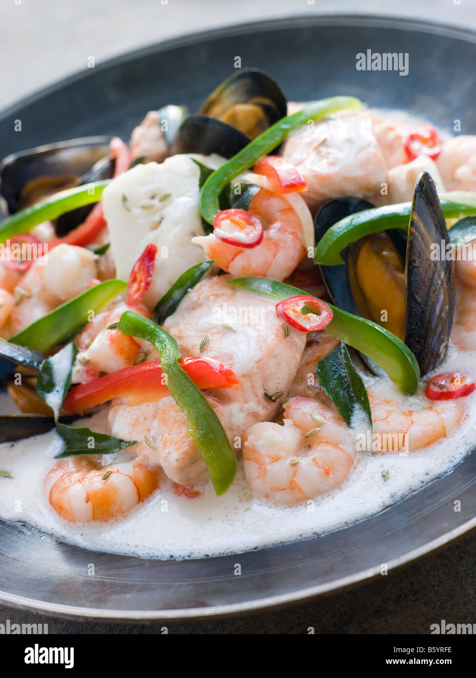 Malaya fish Curry with Coconut Stock Photo - Alamy