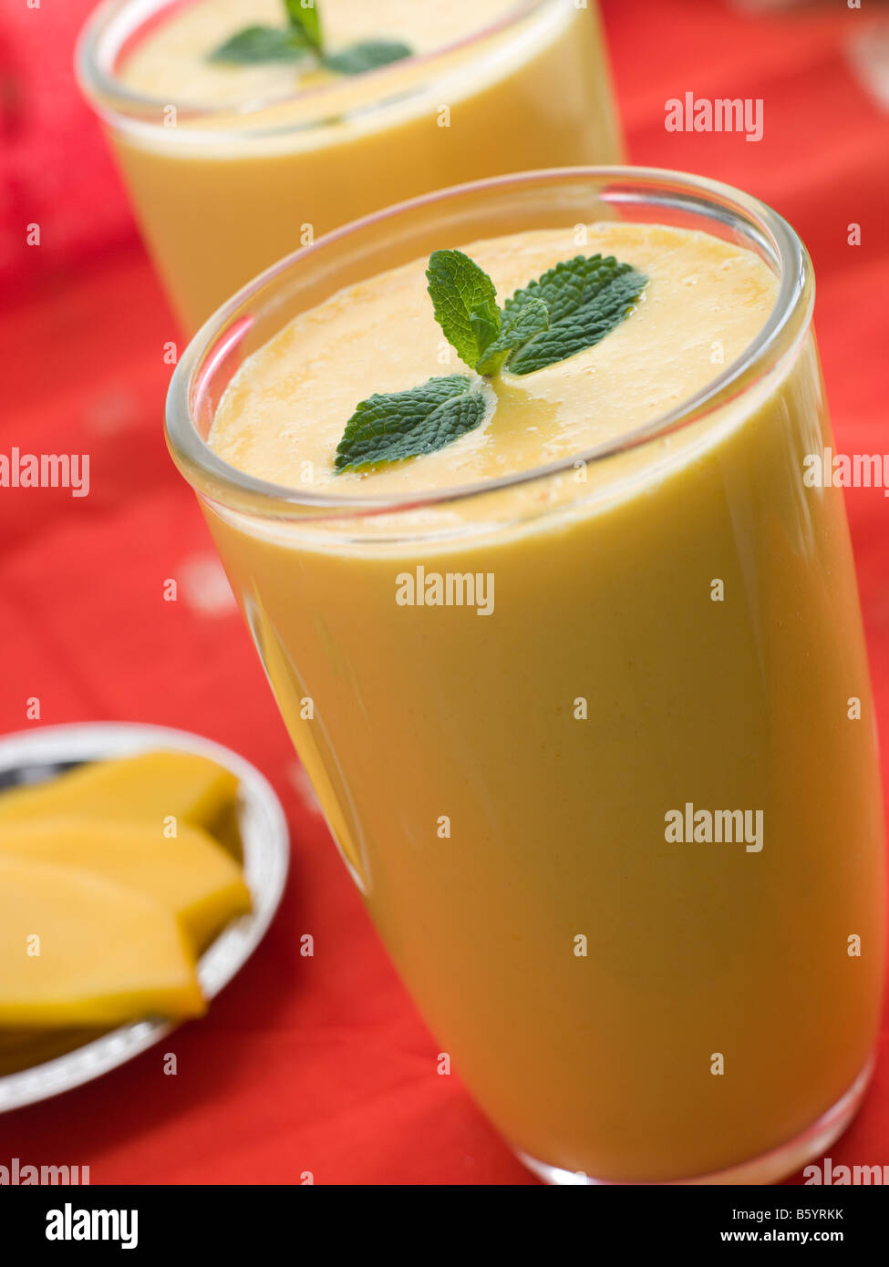 Glasses of Mango Lassi Stock Photo - Alamy