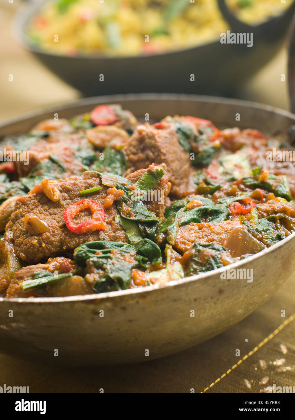 Karai Dish with Lamb Methi Gosht and Vegetable Pilau Stock Photo - Alamy