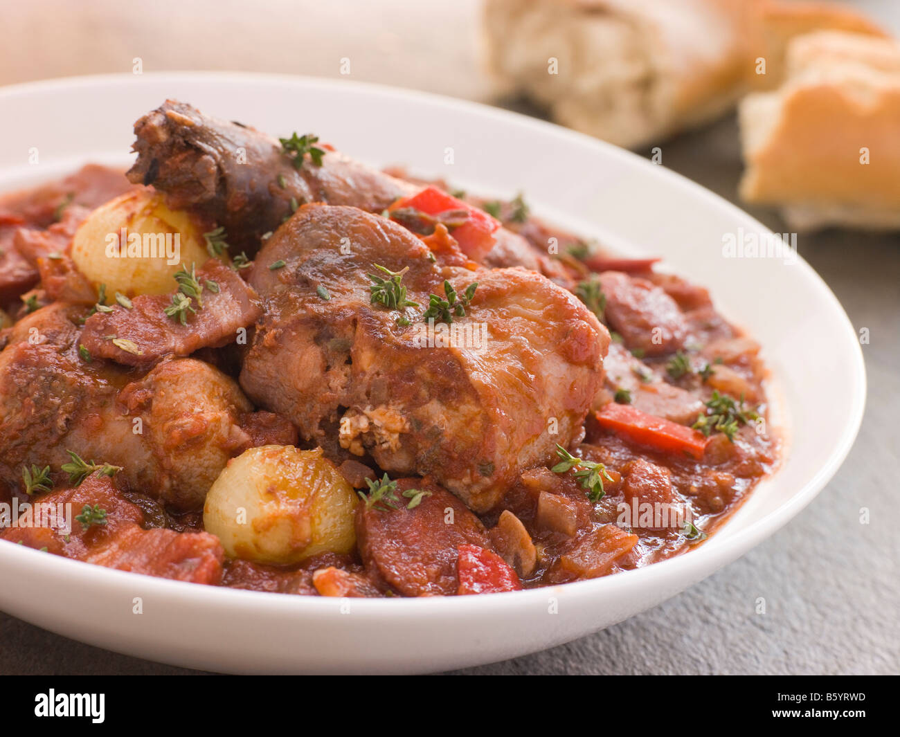 Rabbit Bread Chorizo Stew with Button Onions Stock Photo - Alamy