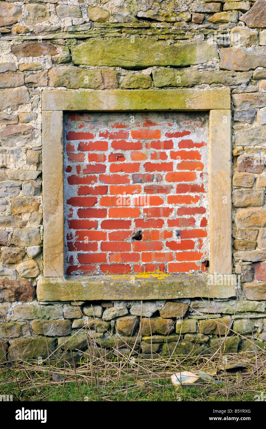 A bricked up window in an old house Stock Photo - Alamy