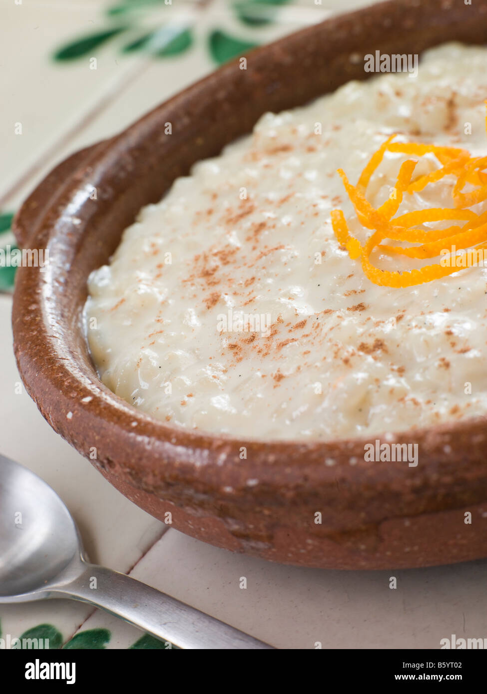 Orange and Cinnamon Rice Pudding Stock Photo - Alamy