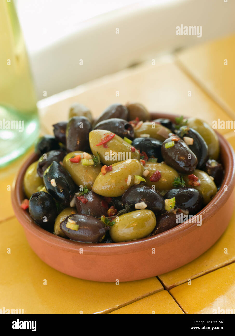 Dish of Mixed Marinated Olives Stock Photo - Alamy