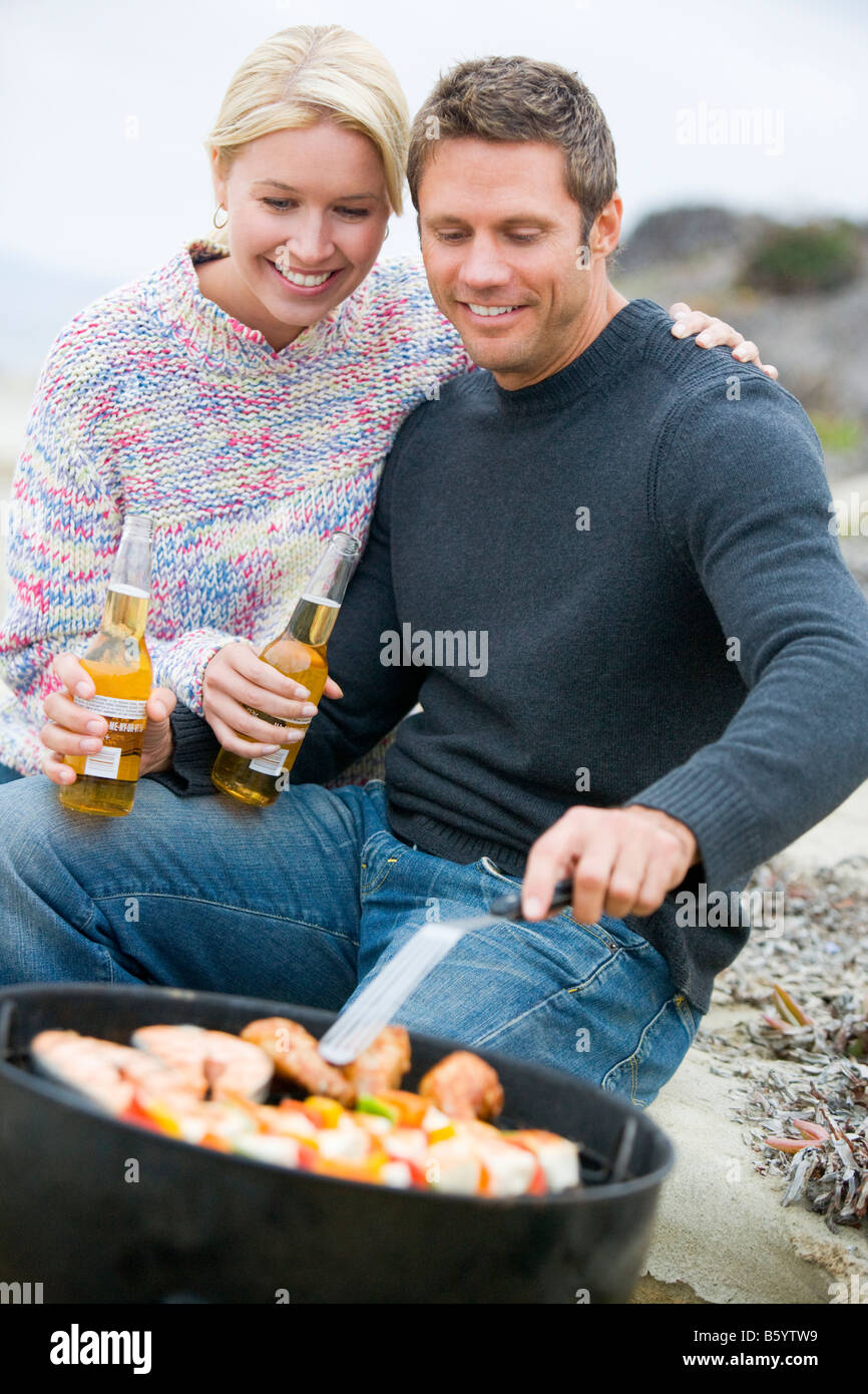 Middle aged beach bbq couple hi-res stock photography and images - Alamy