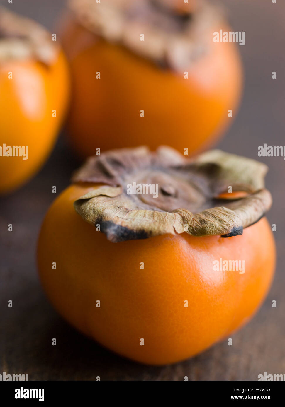 Persimmon, Sharon Fruit Stock Photo - Alamy