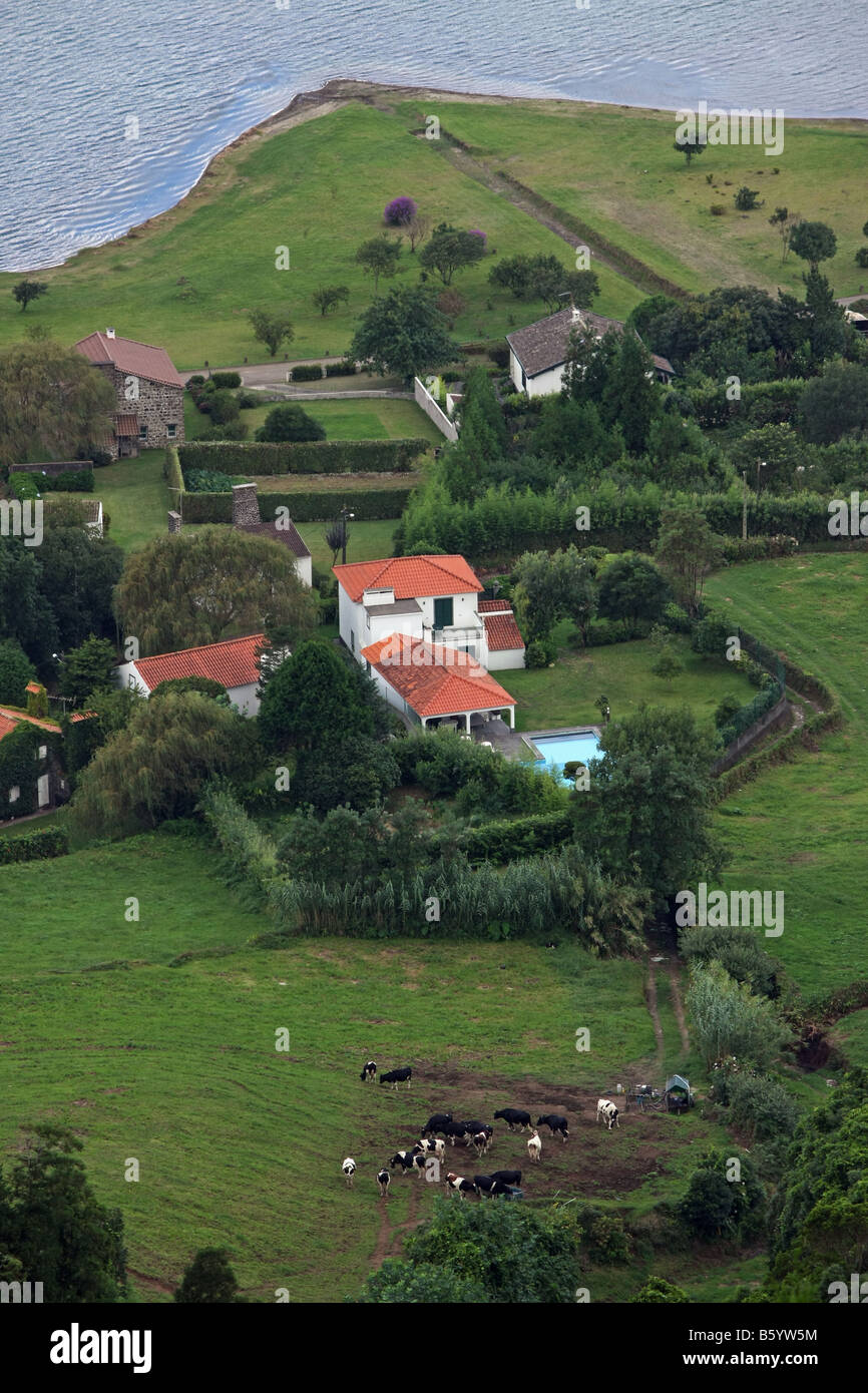 Aerial view of houses and cows at Sete Cidades, São Miguel, Azores ...