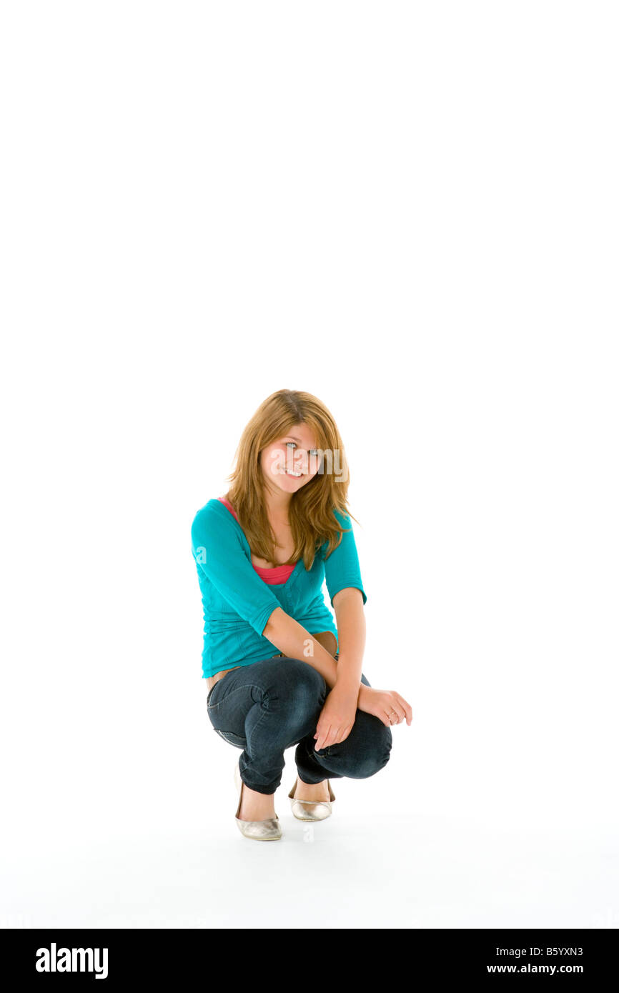 Crouching teen girl one hi-res stock photography and images - Alamy