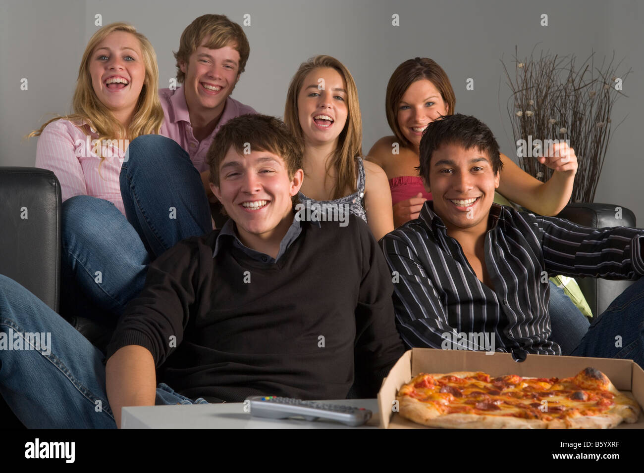 Teenagers Having Fun And Eating Pizza Stock Photo - Alamy