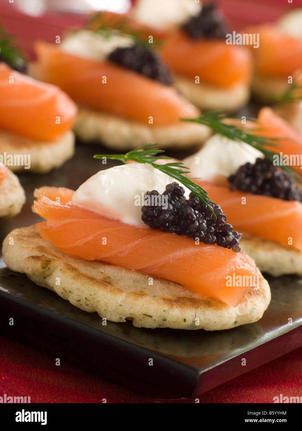 Smoked Salmon Blinis Canap s with Sour Cream and Caviar Stock Photo - Alamy