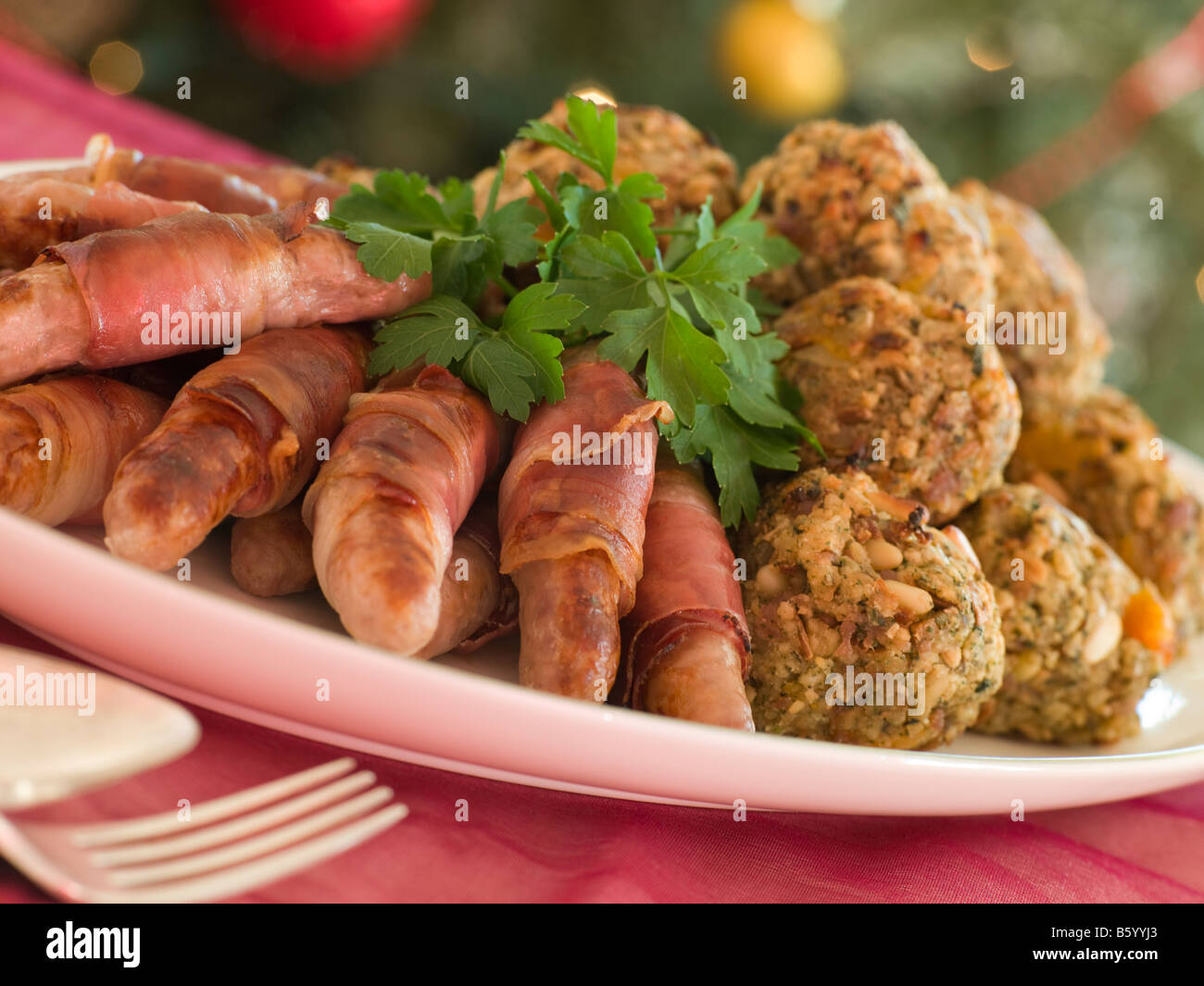 Plate of Pigs in Blankets and Chestnut Stuffing Balls Stock Photo - Alamy