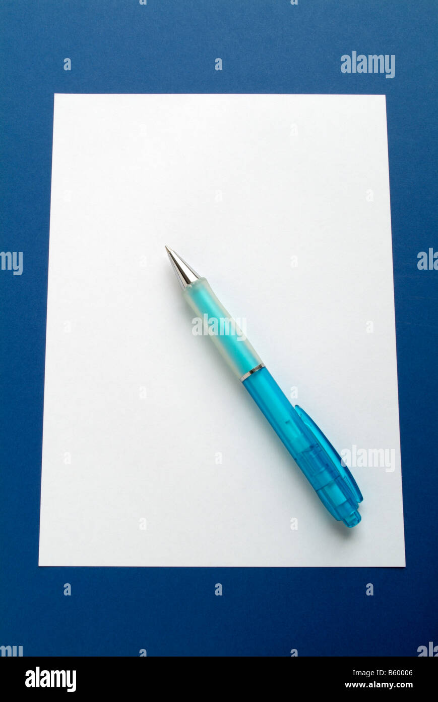 A pen and a blank piece of paper Stock Photo - Alamy